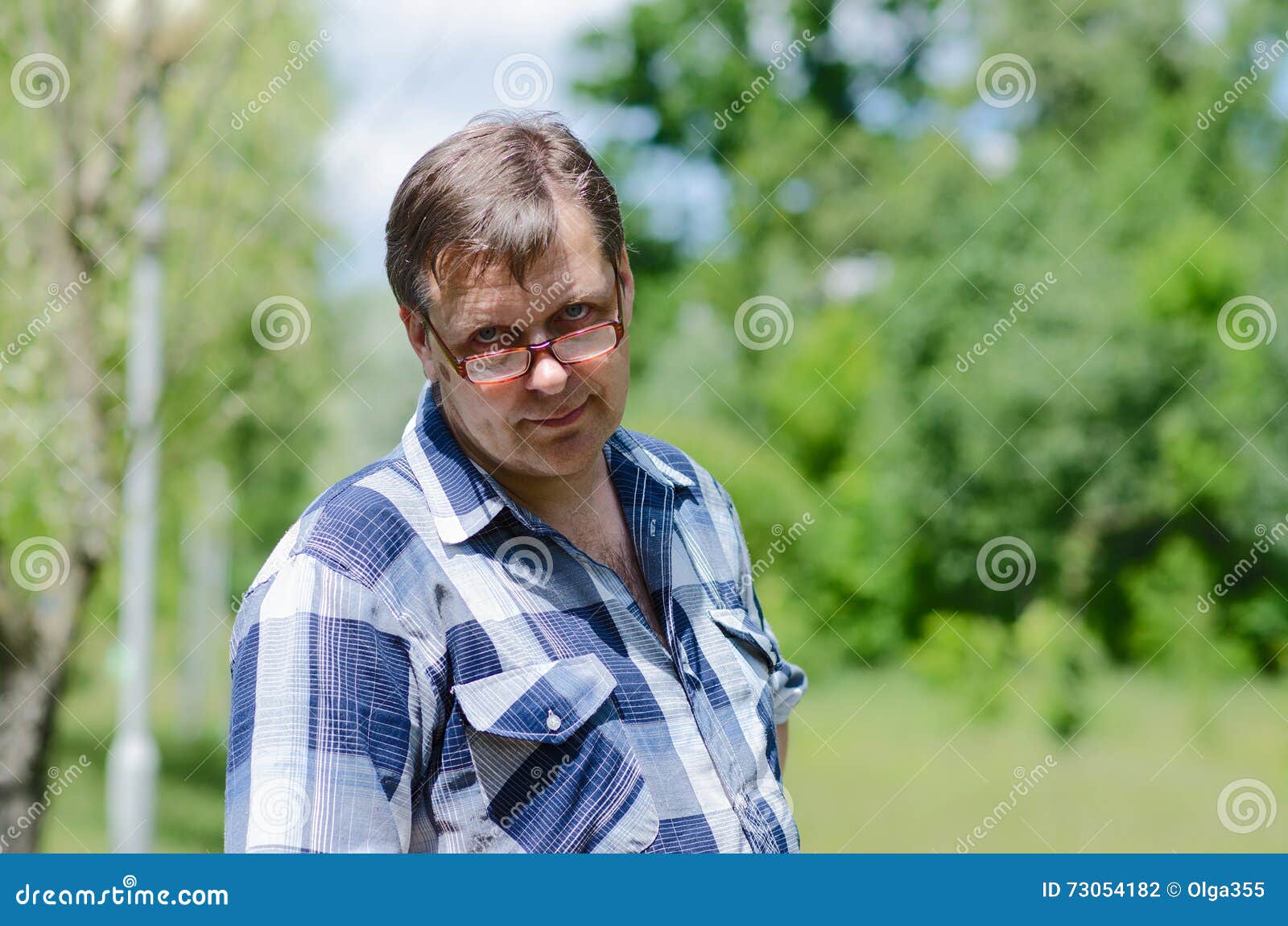 Man is Looking Over His Glasses with Skepticism Stock Photo - Image of ...