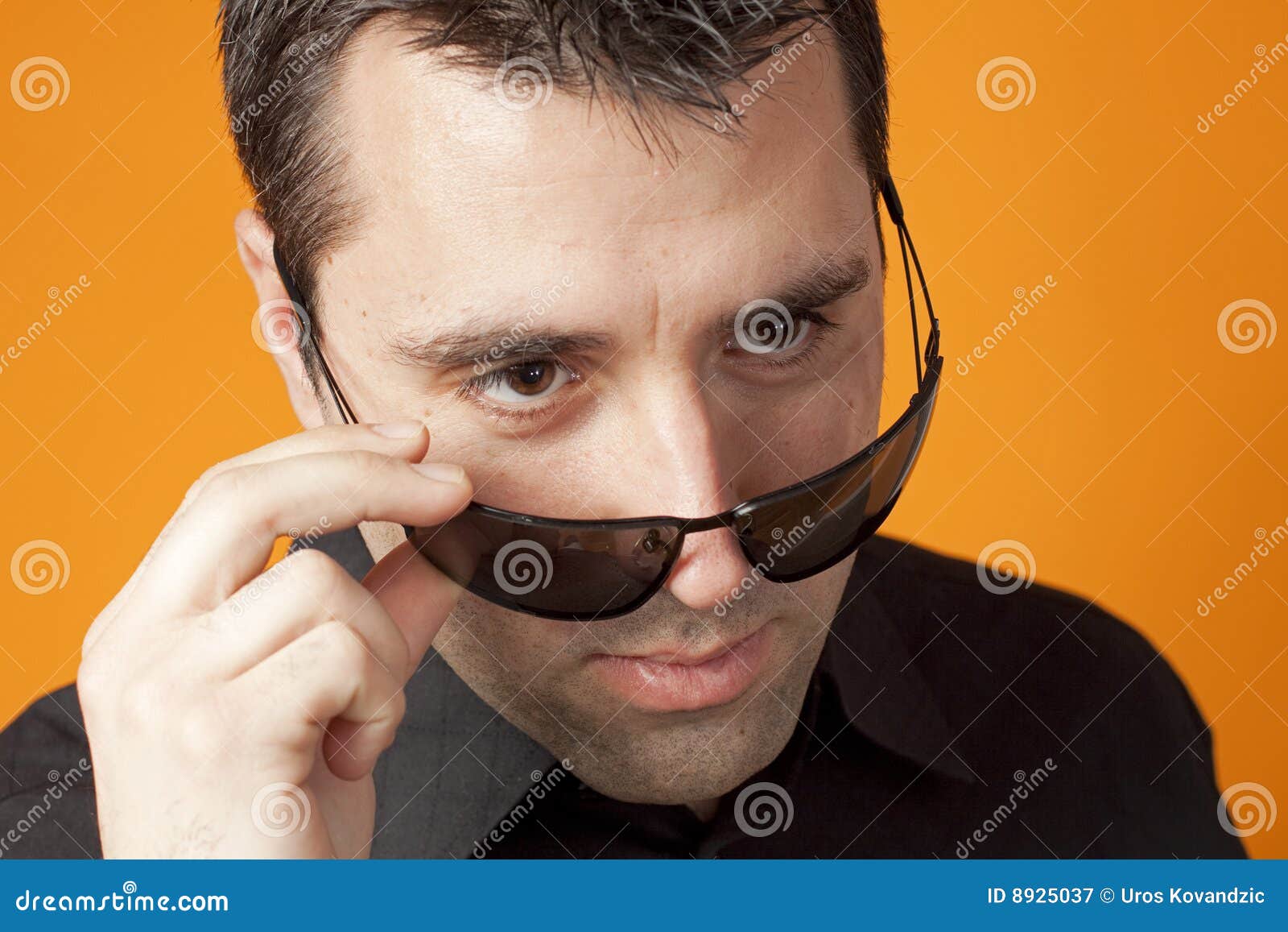 Man Looking Over His Sunglasses Stock Image - Image of macho, confident ...