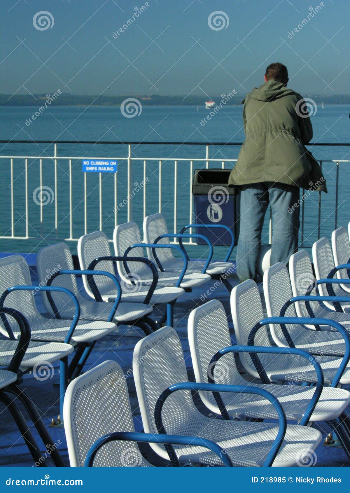 Man looking over railing stock image. Image of cruise, abstract - 218985