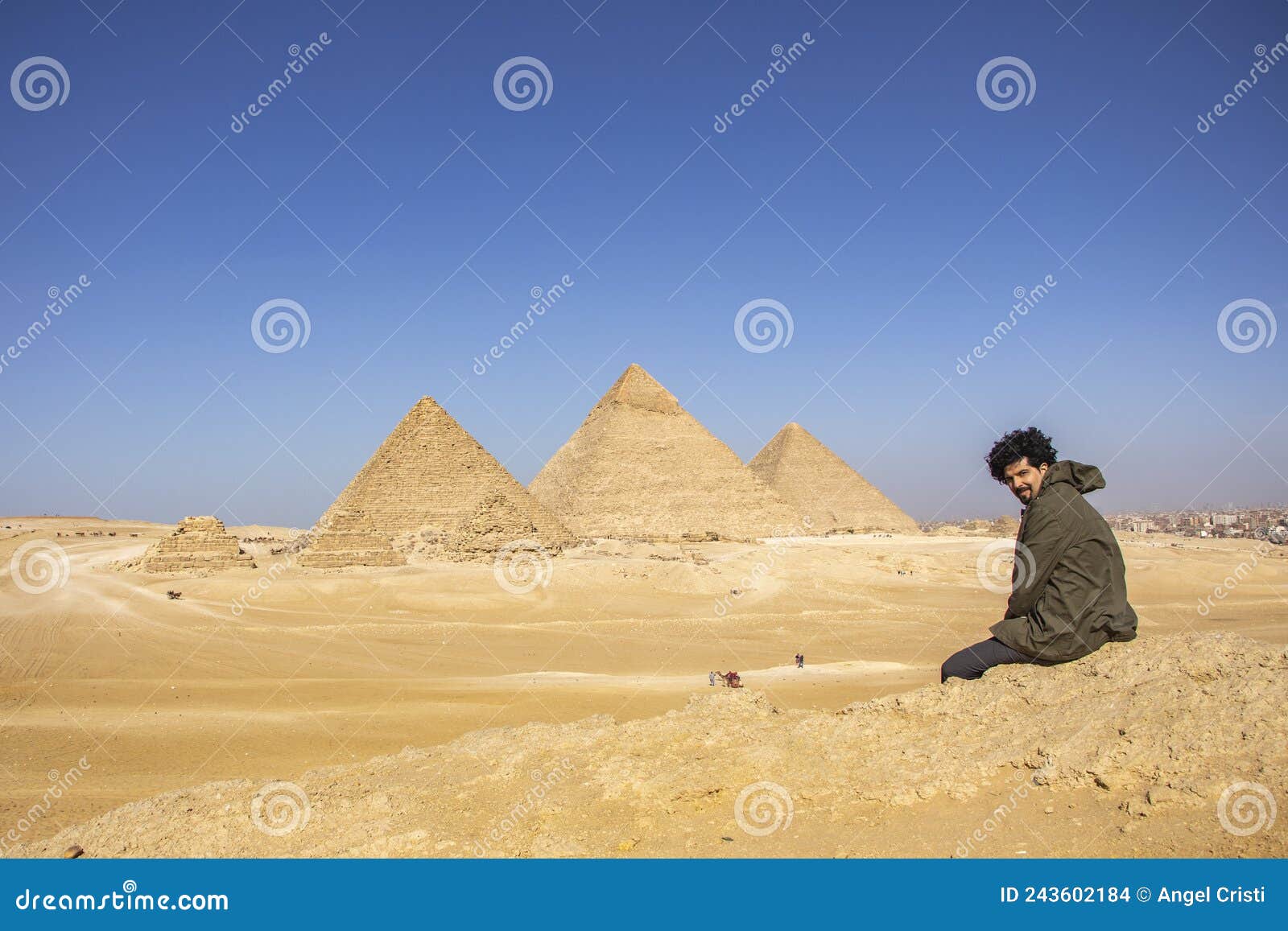 Man Looking at the Panoramic View of the Pyramids Stock Photo - Image ...