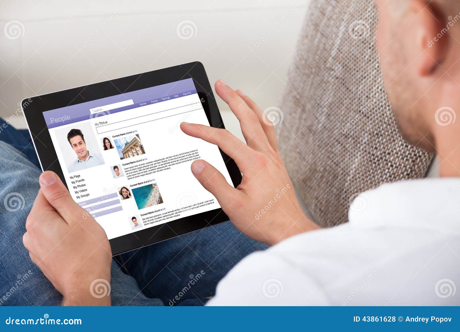 Man Looking at Personal Profiles on a Tablet Stock Photo - Image of ...