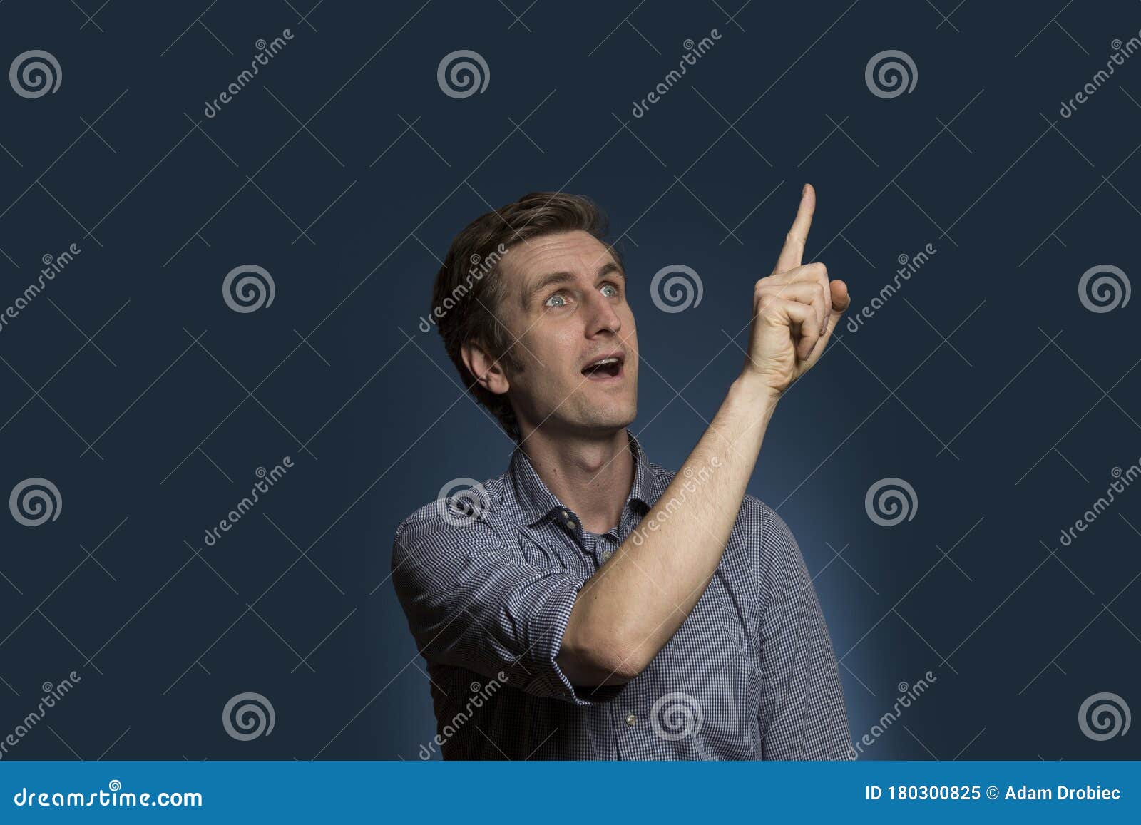 Man Looking and Pointing Upwards with Amazed Expression Stock Image ...