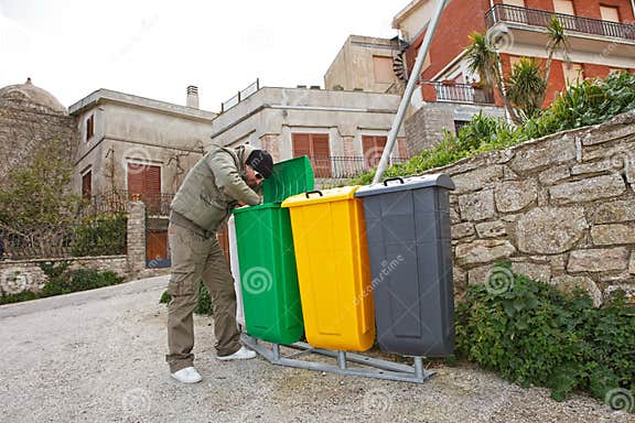Man Looking into Recycle Bin Stock Photo - Image of environment ...