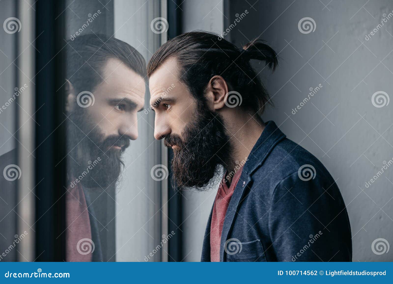 Man Looking at Reflection in Glass Stock Photo - Image of glass ...