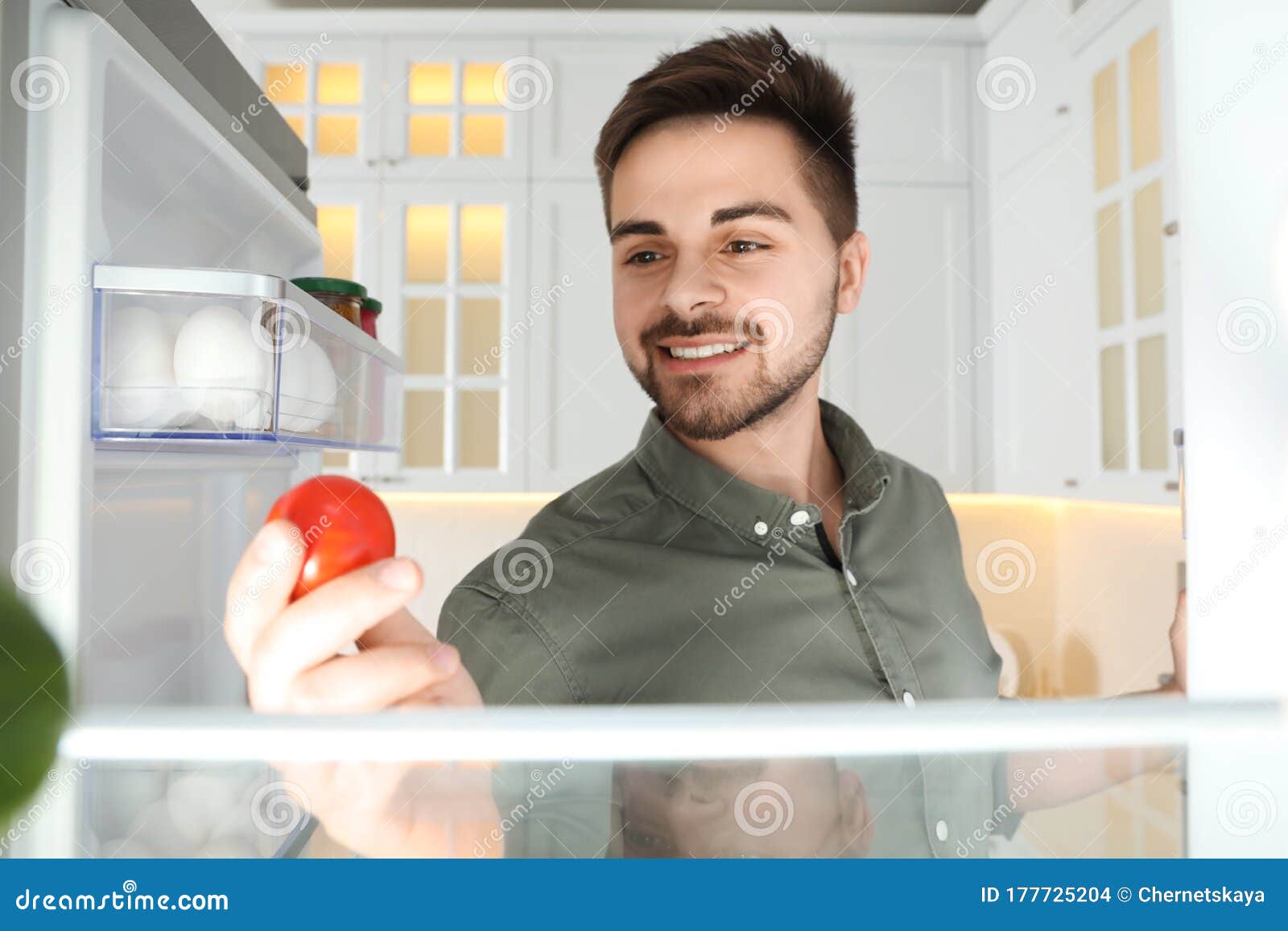 Man Looking into Refrigerator, View from Inside Stock Photo - Image of ...