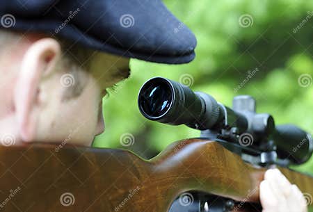 Man Looking through Scope on Stock Photo - Image of gauge, bullet: 14605836
