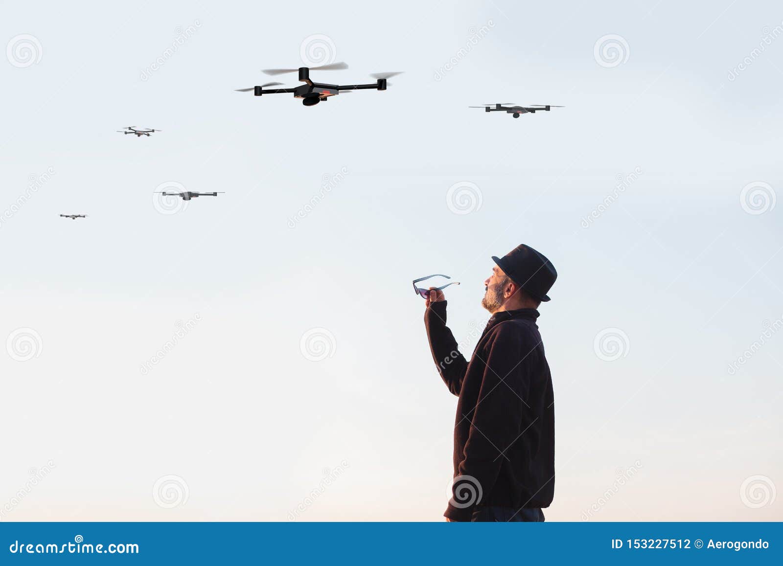 Man Looking at the Sky Filled Drones Drones Stock Photo - Image of ...