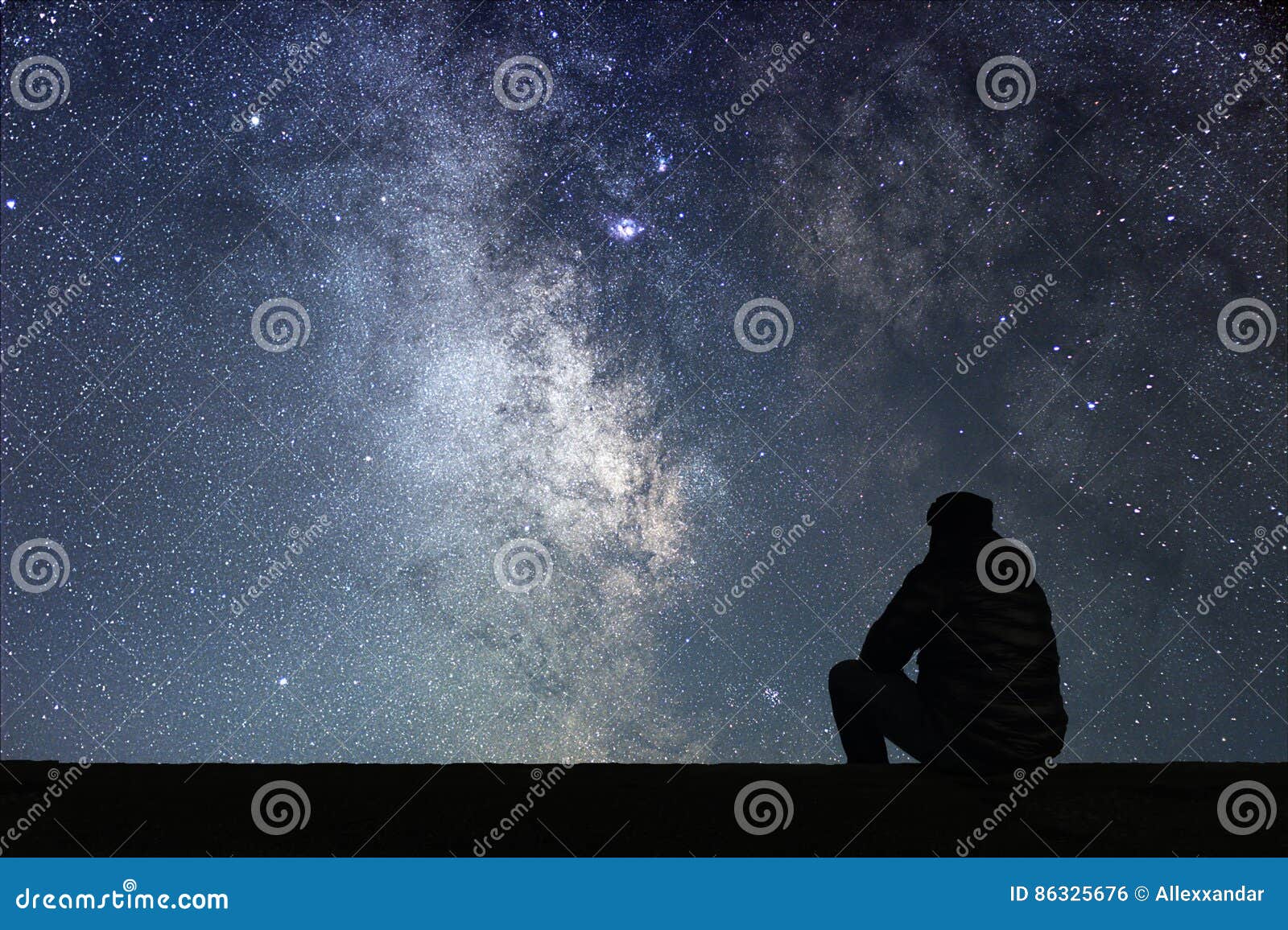 Man looking at the stars stock photo. Image of milky - 86325676