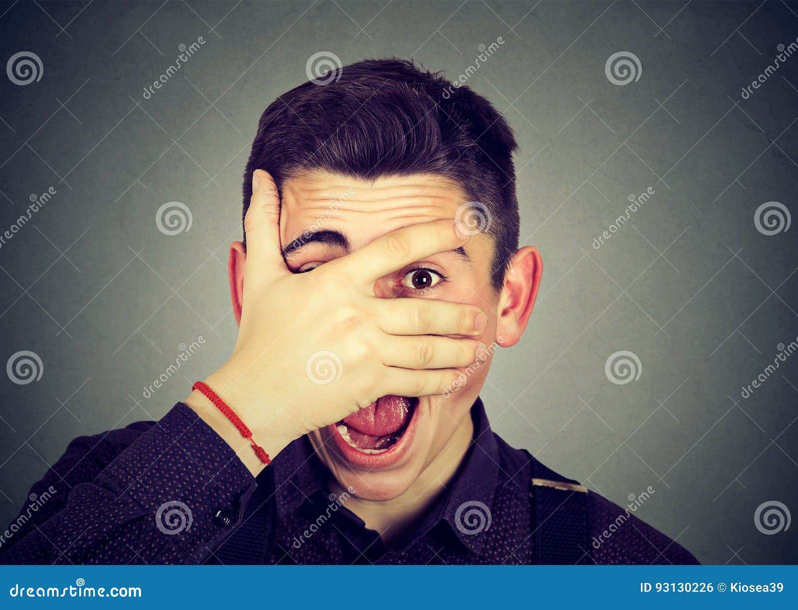 Man Looking Surprised in Disbelief, with Hand on Face Stock Photo ...