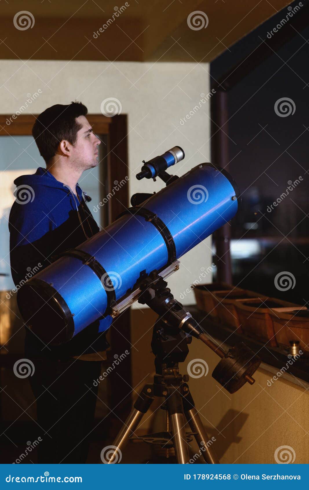Man Looking through Telescope. Stock Photo - Image of concepts ...