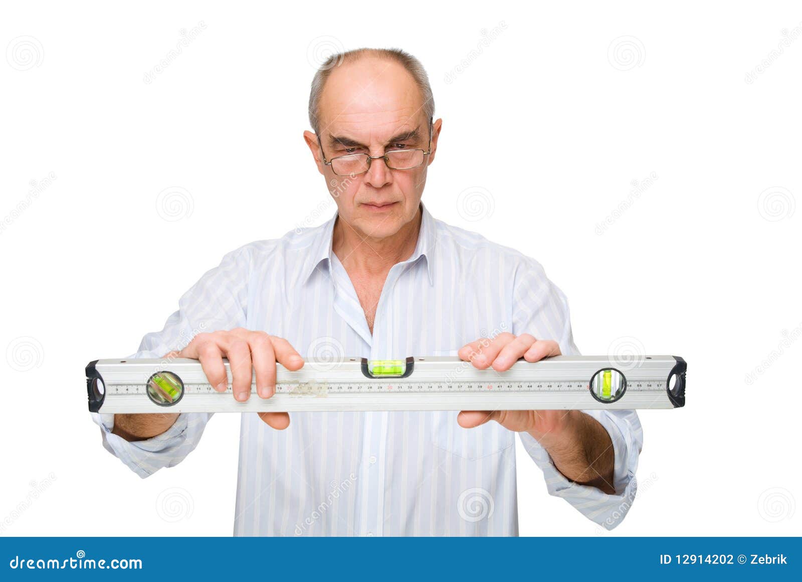 Man looking to level tool stock photo. Image of level - 12914202