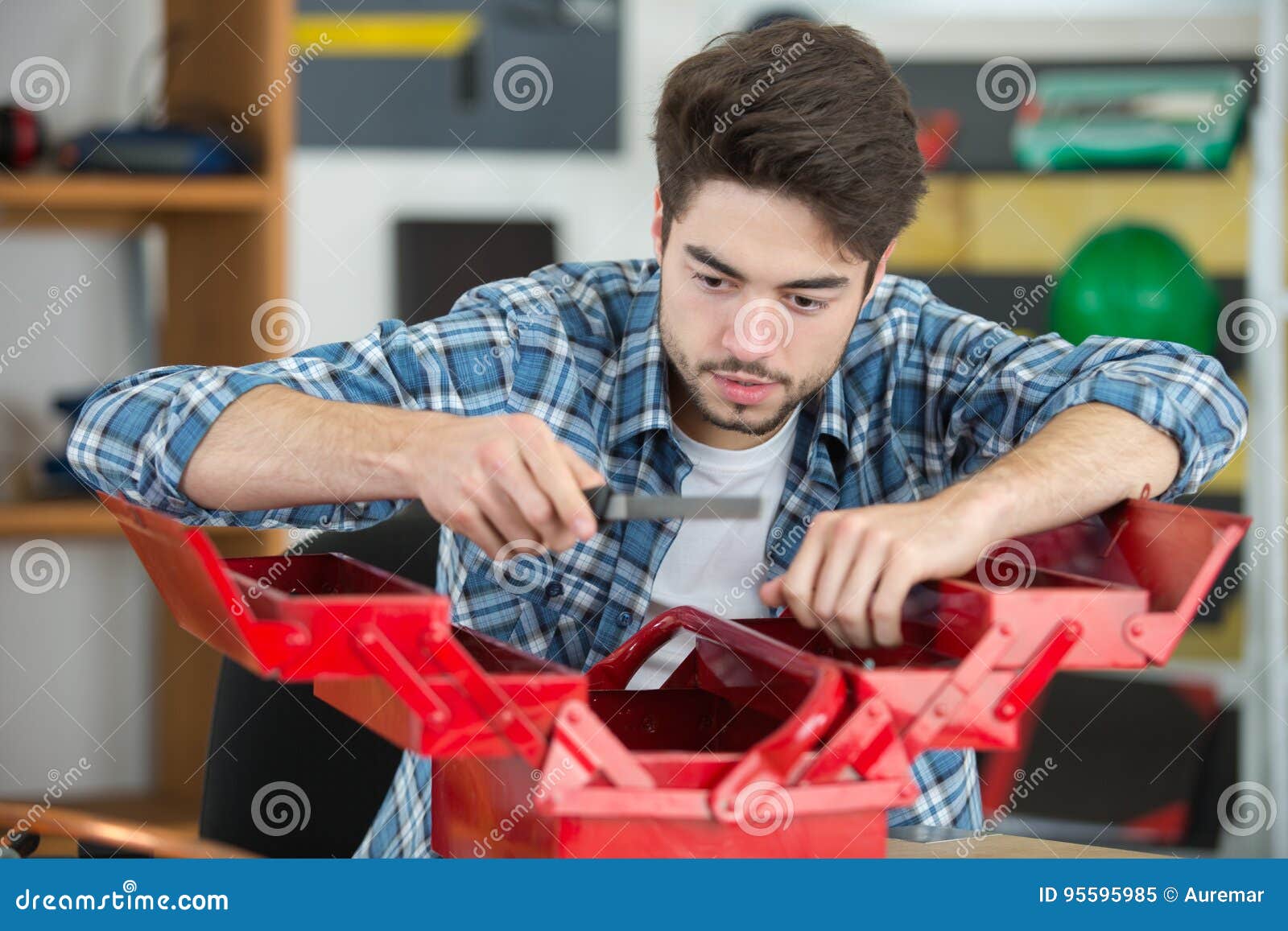 Man looking in tool box stock image. Image of standing - 95595985