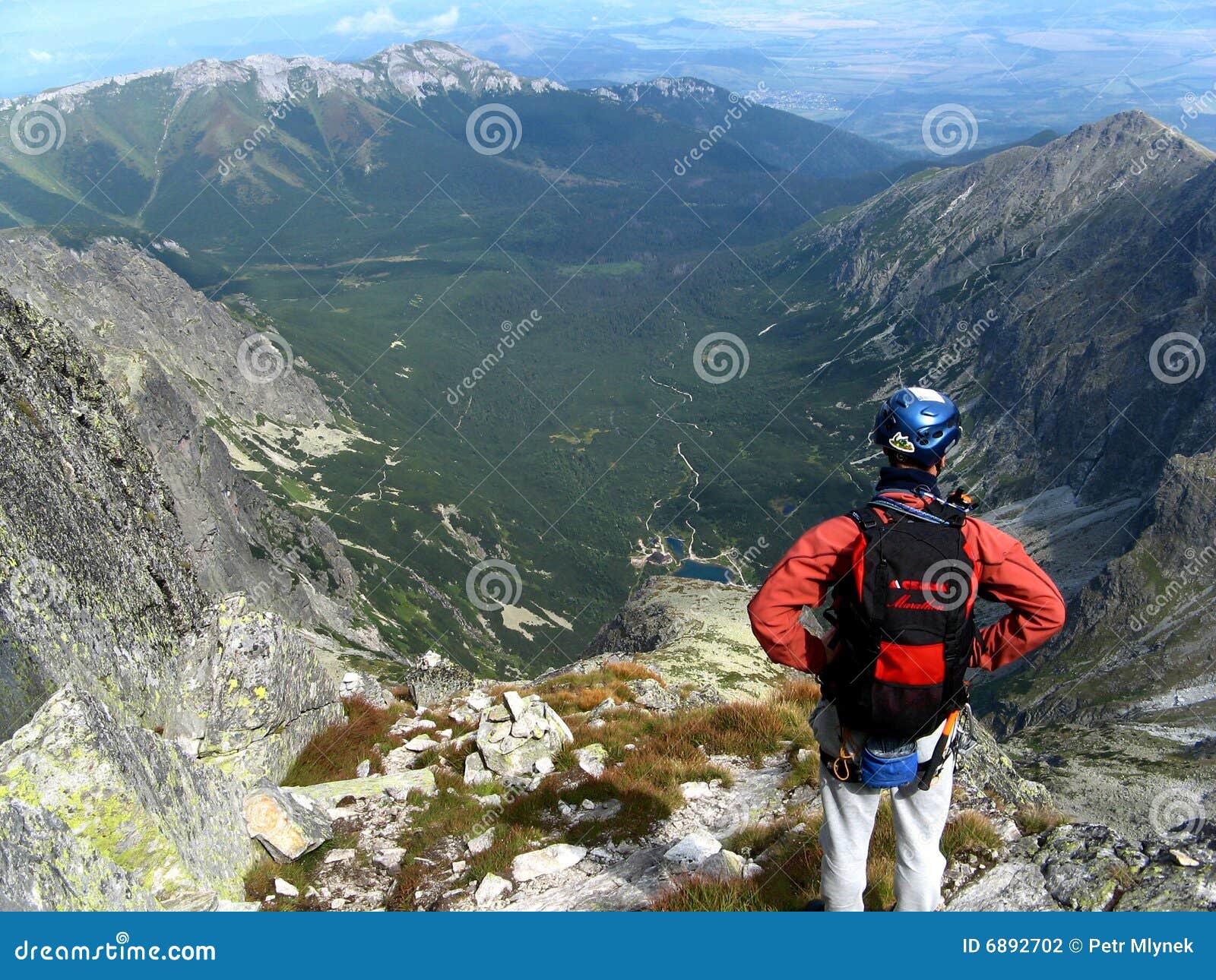 Man Looking from Top of Mountain Stock Photo - Image of climber ...