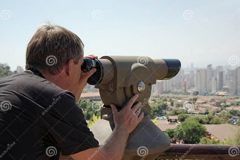 Man Looking through Viewpoint Telescope. Stock Image - Image of urban ...