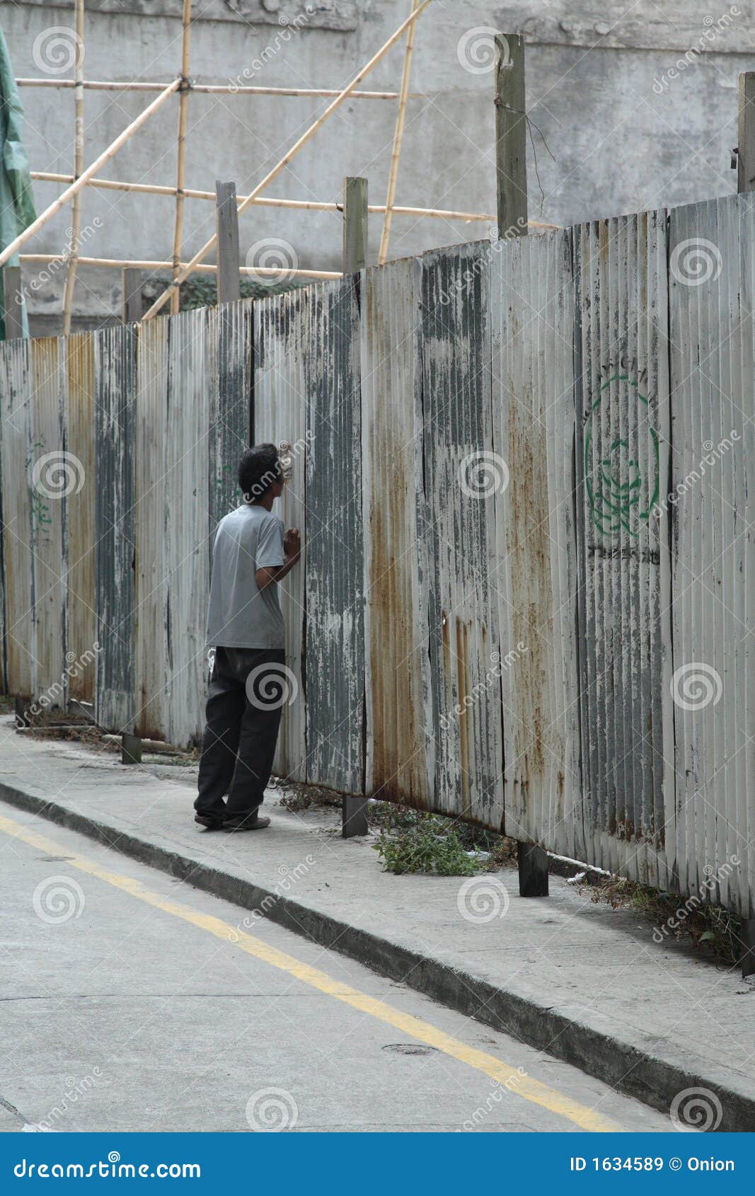Man Looking through the Wall Stock Image - Image of seek, construction ...