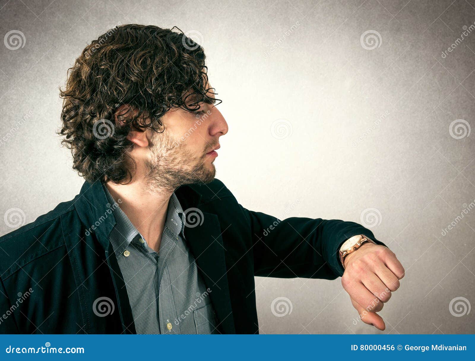 Man looking on watch stock photo. Image of clock, look - 80000456