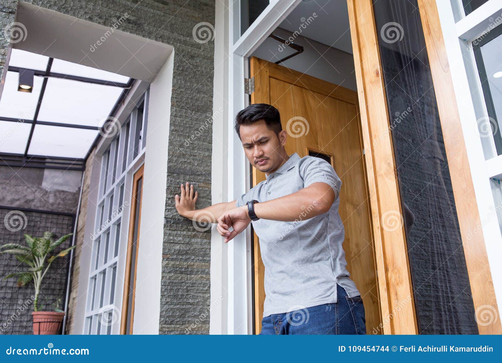 Man looking watch stock photo. Image of person, waiting - 109454744