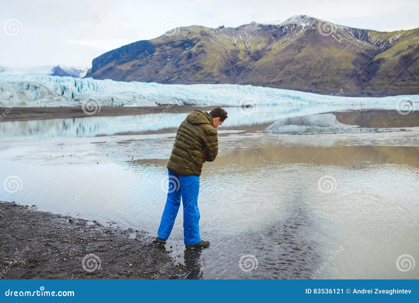 Man Looking into Water stock image. Image of color, clothing - 83536121