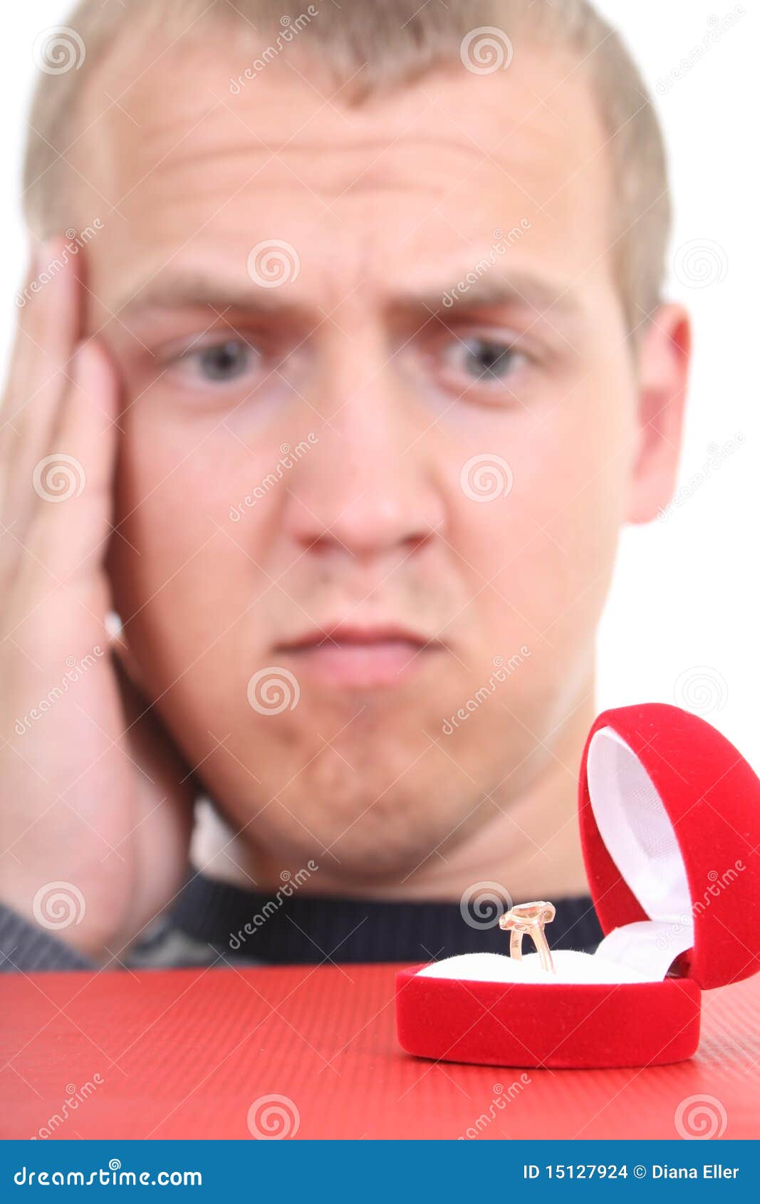 Man Looking at Wedding Ring. Focus on Ring Stock Photo - Image of ...