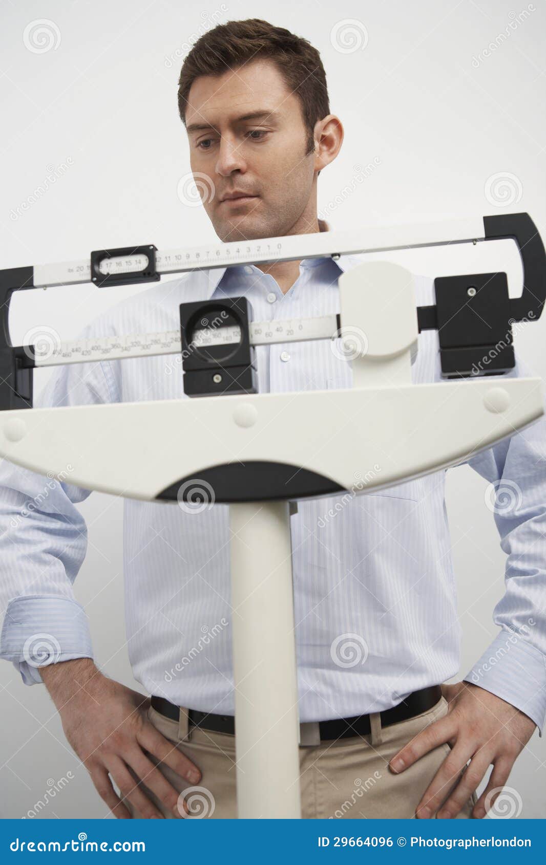 Man Looking at Weighing Scale Stock Photo - Image of healthy, people ...