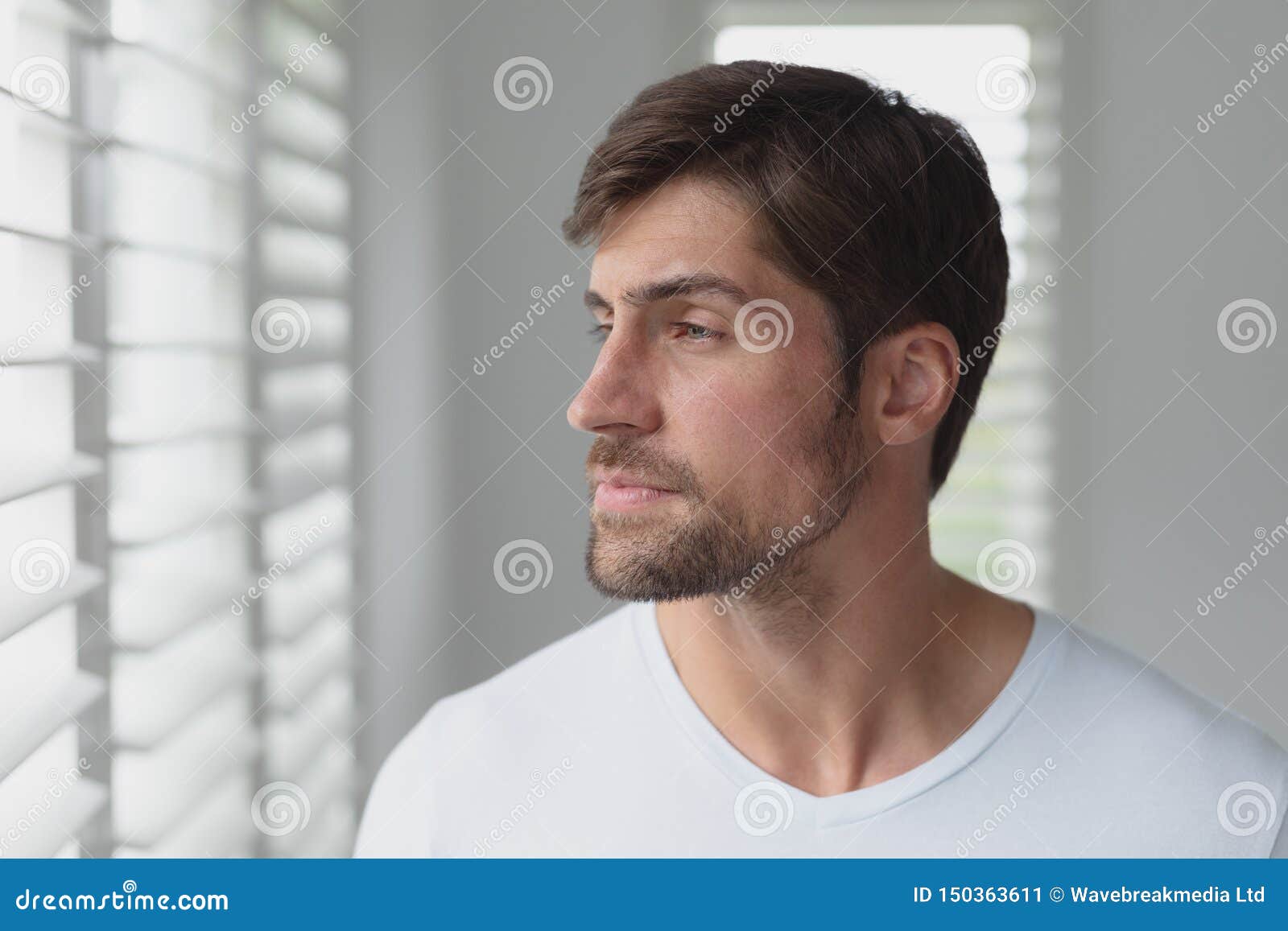 Man Looking through Window Blind at Home Stock Image - Image of casual ...
