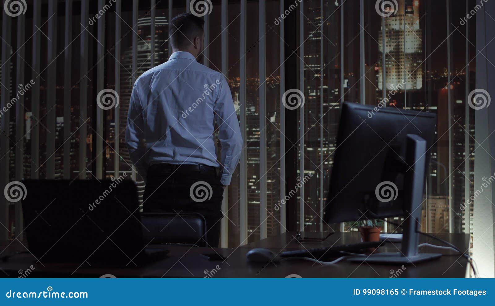 Man Looking in Window at Night Stock Image - Image of manager, person ...