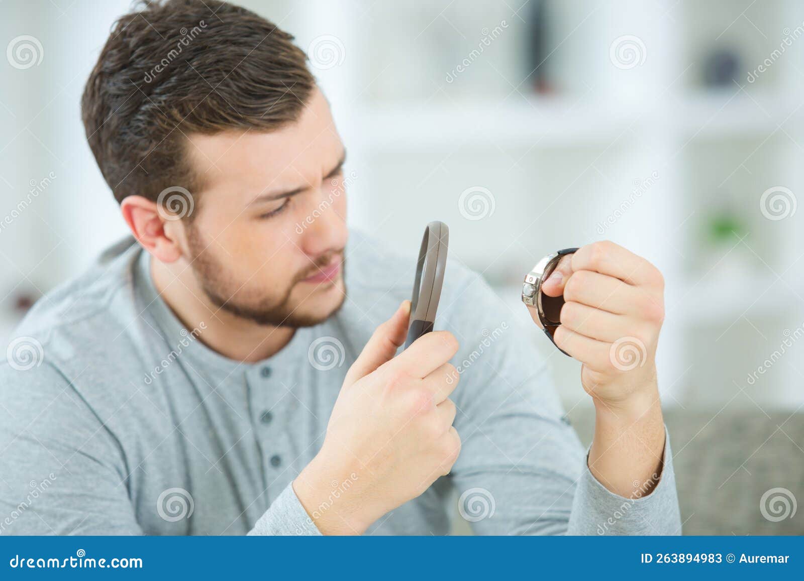 Man Looking at Wristwatch through Magnifying Glass Stock Image - Image ...