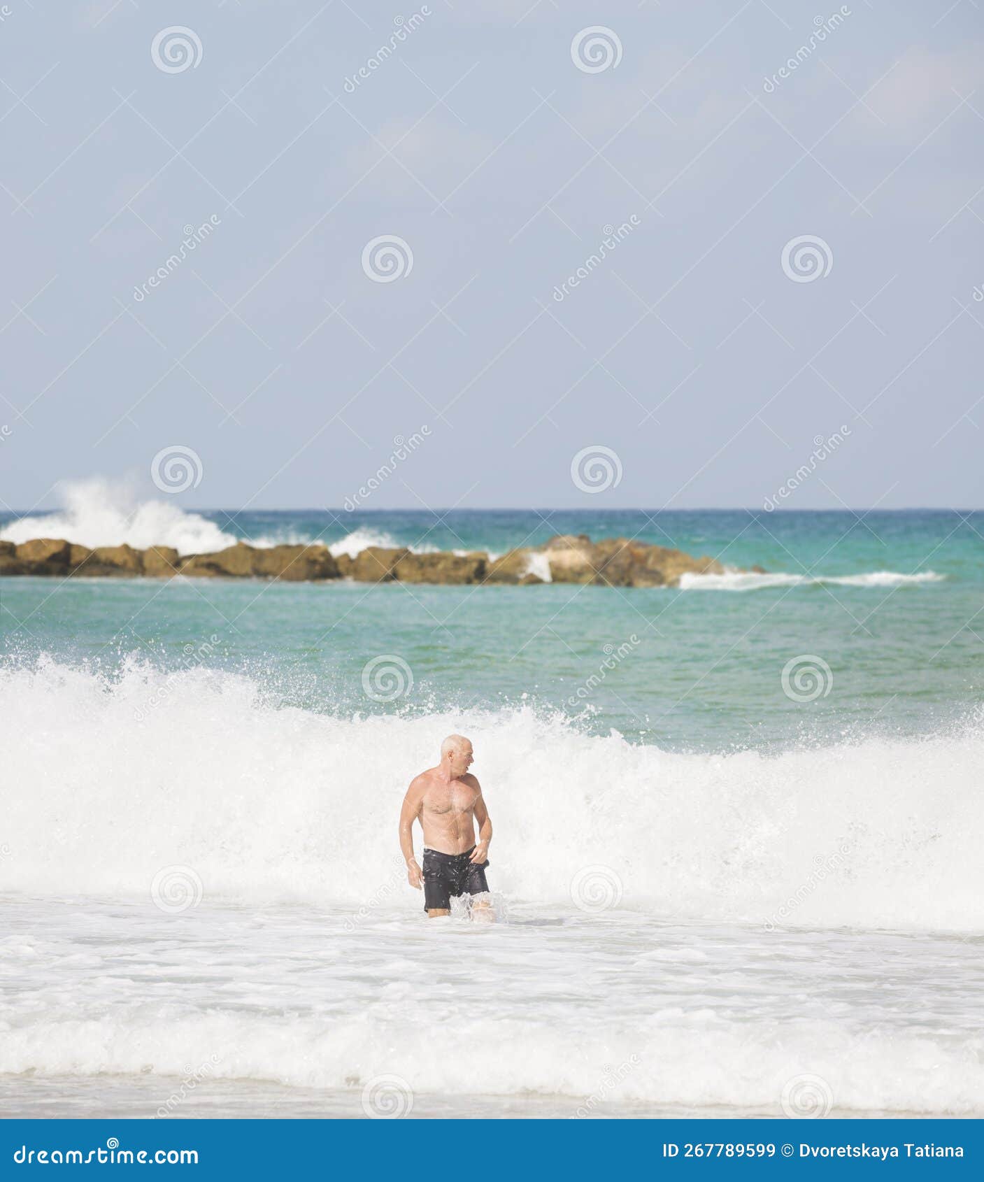 The Man Looks Back at the Wave that Knocked Him Down Stock Image ...