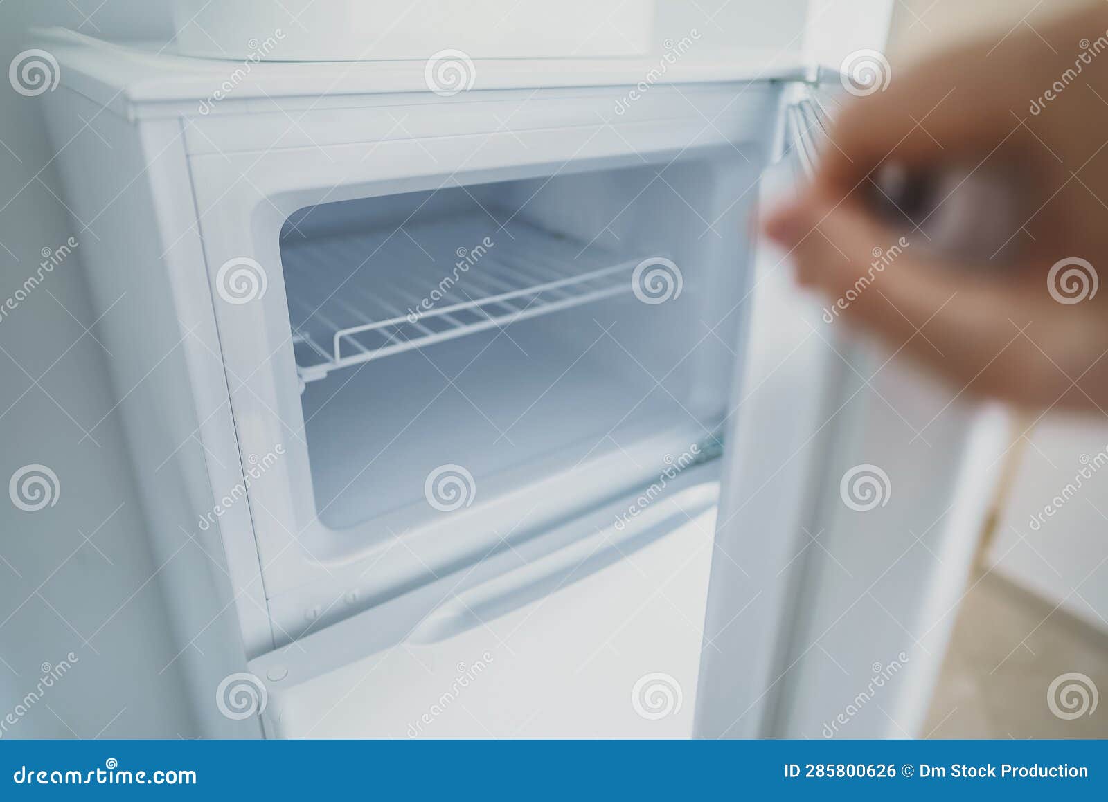 Man Looks at an Empty Open Freezer Stock Photo - Image of frustrated ...