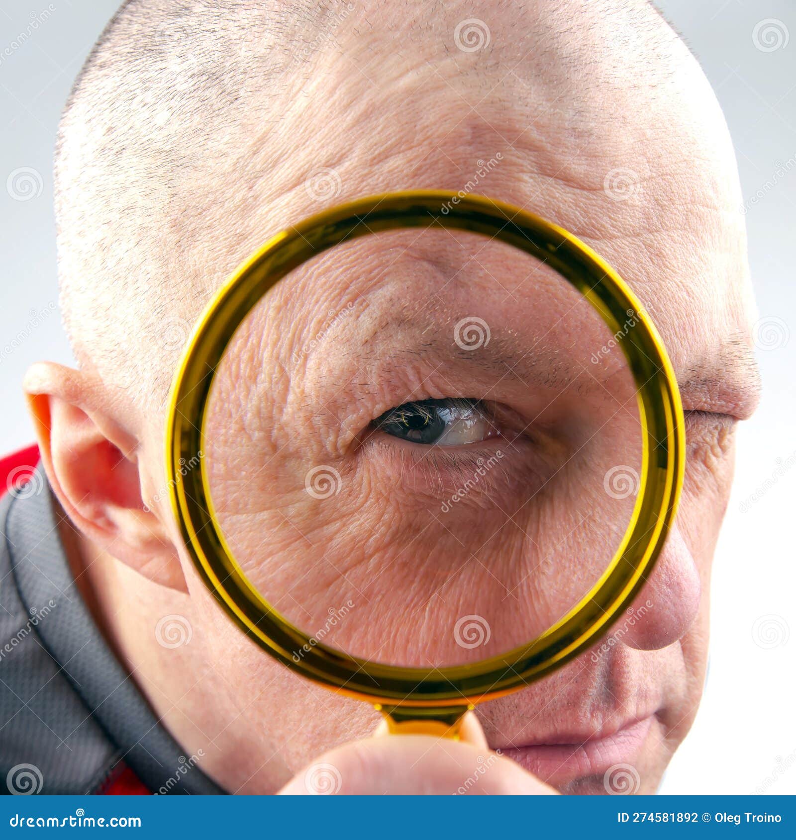 Man Looks through a Magnifying Glass Stock Photo - Image of search ...