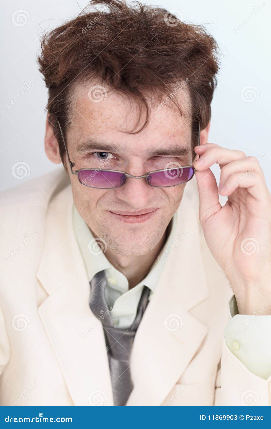 Man Looks Over Eyeglasses Crookedly Grinning Stock Image - Image of ...
