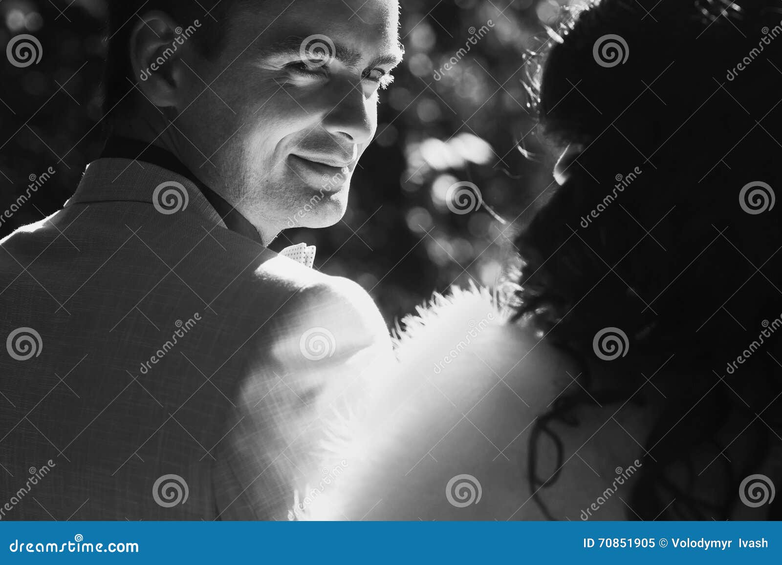 Man Looks Over His Shoulder with a Glance and Smile Stock Image - Image ...