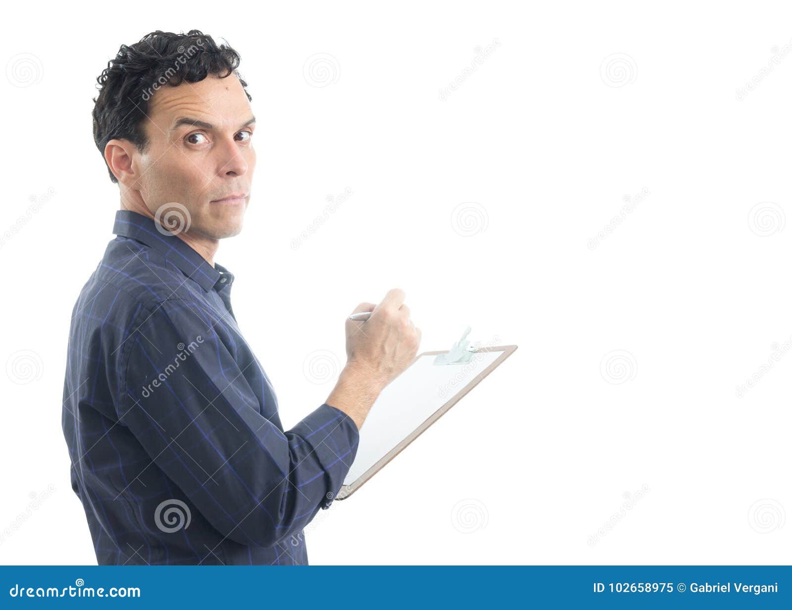 Man Looks Sideways and Makes Notes on Clipboard. the Person is W Stock ...