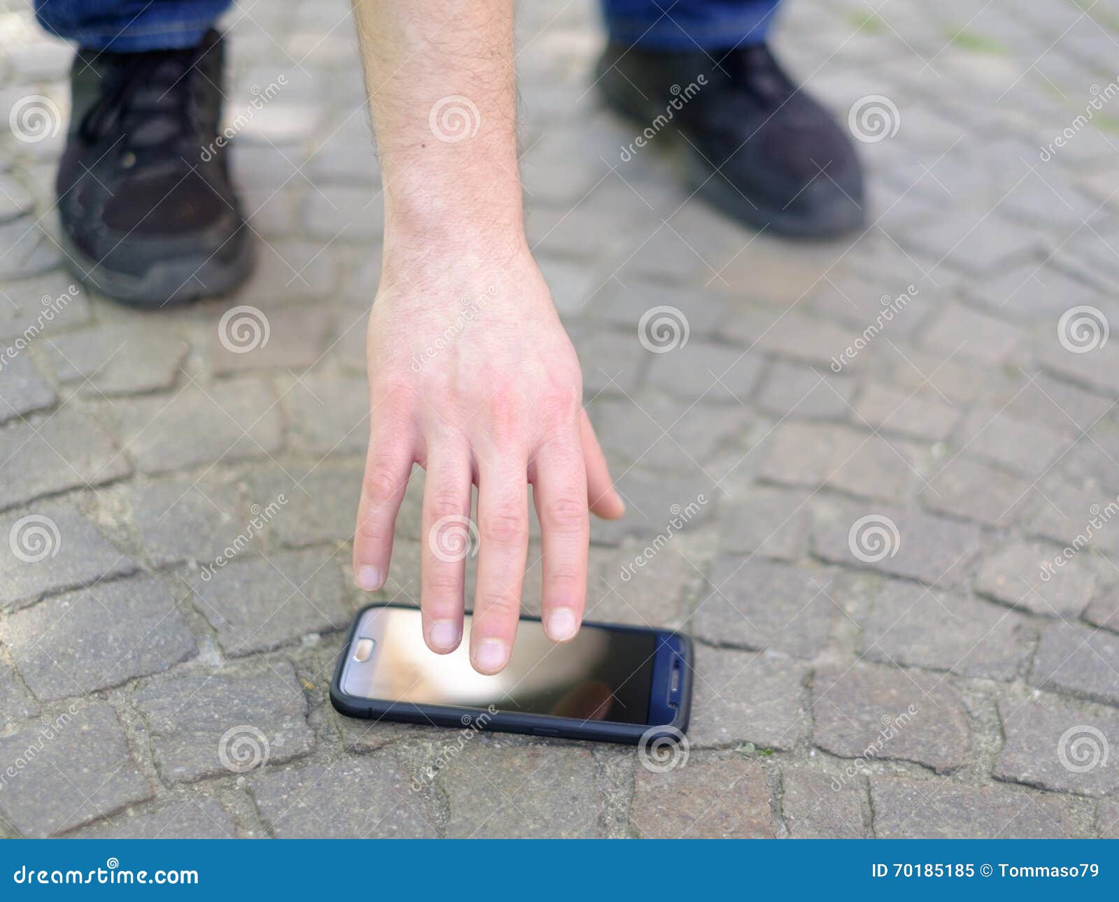 Man losing his smart-phone stock image. Image of pavement - 70185185