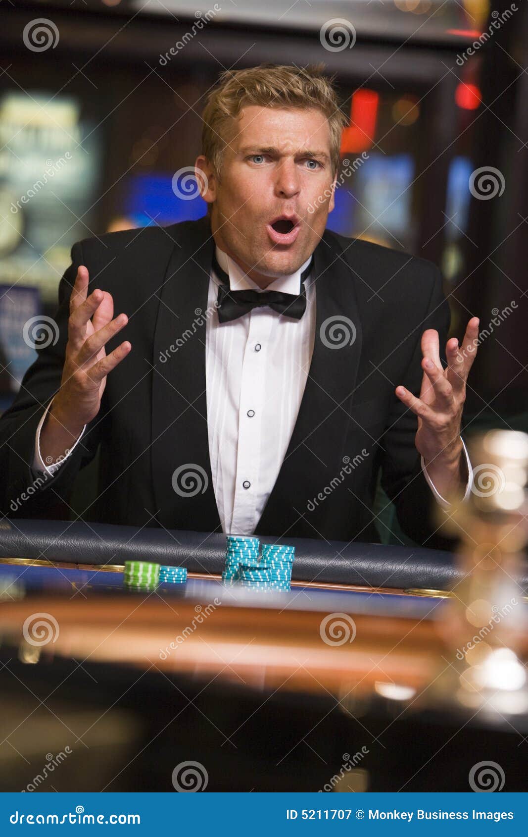 Man Losing at Roulette Table Stock Image - Image of indoors, caucasian ...