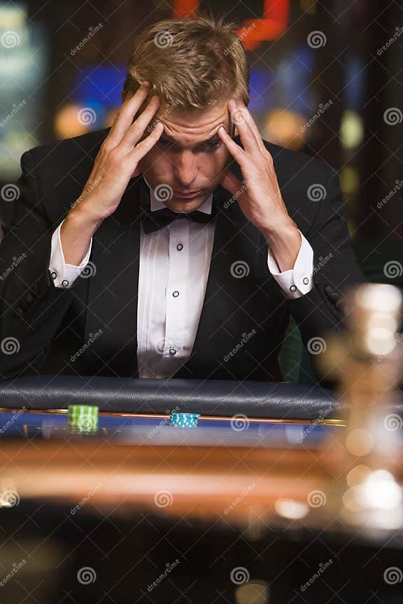 Man Losing at Roulette Table Stock Image - Image of depressed ...