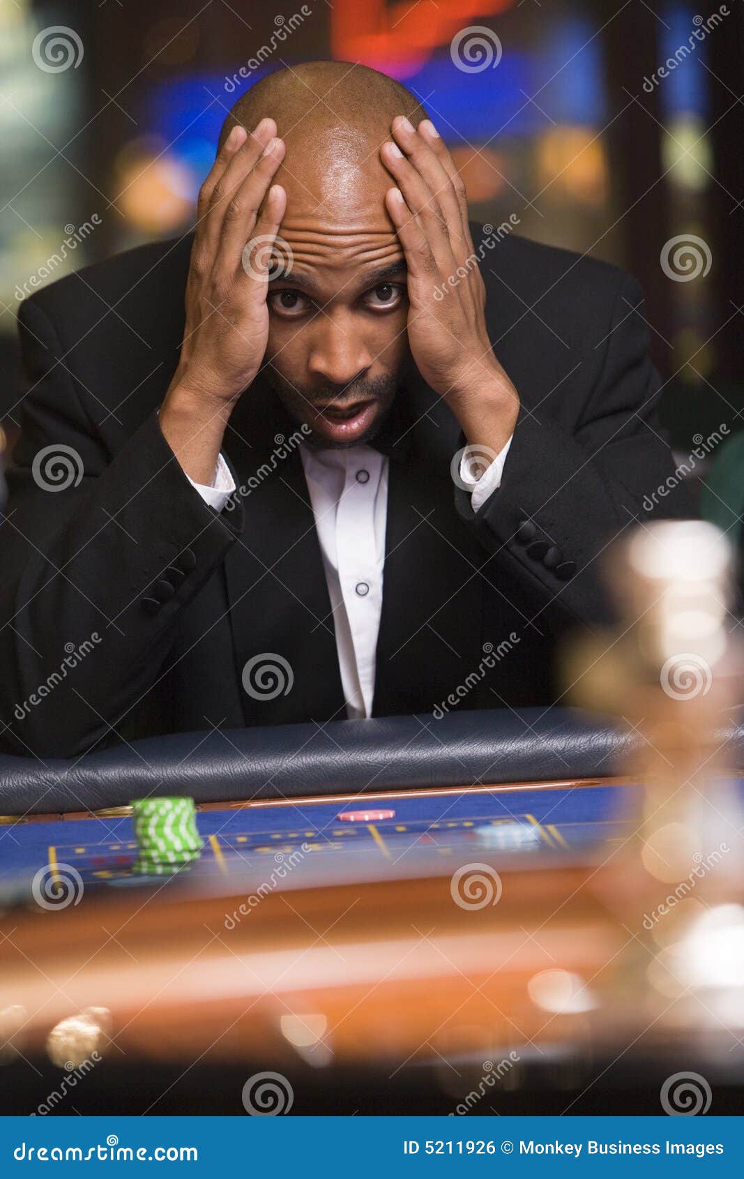 Man Losing at Roulette Table Stock Photo - Image of evening, lifestyle ...