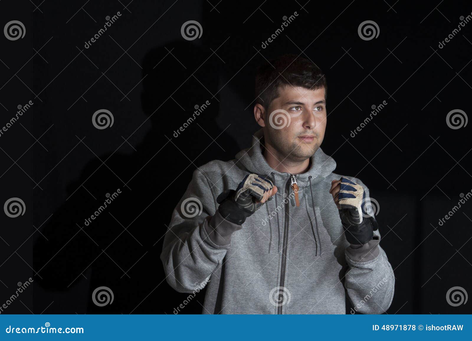 Man in low key light stock photo. Image of dark, aggression - 48971878