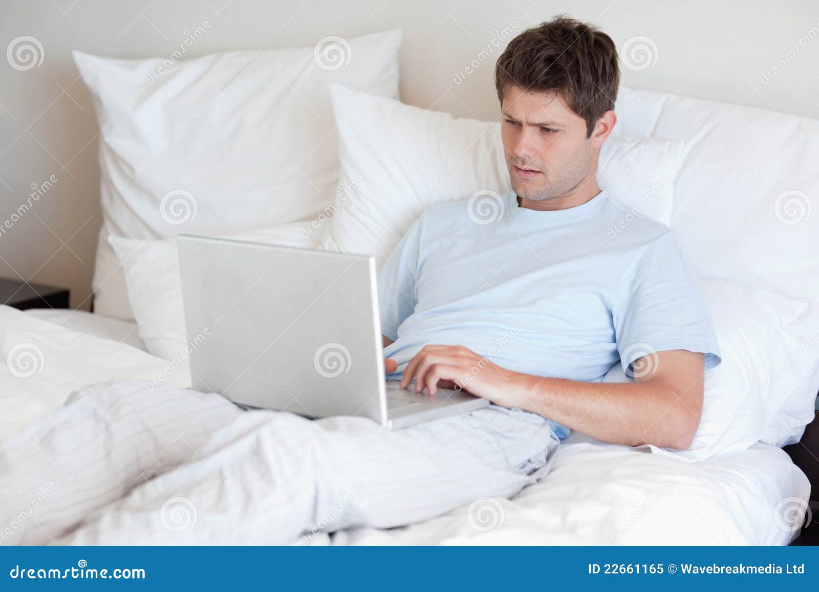 Man Lying in Bed with Laptop Stock Image - Image of home, comfortable ...