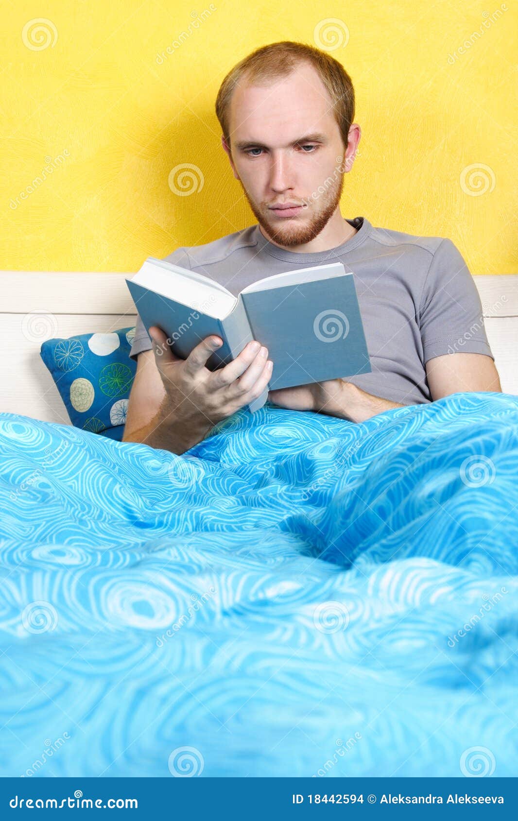 Man Lying in Bed and Reading Book Stock Photo - Image of bright ...