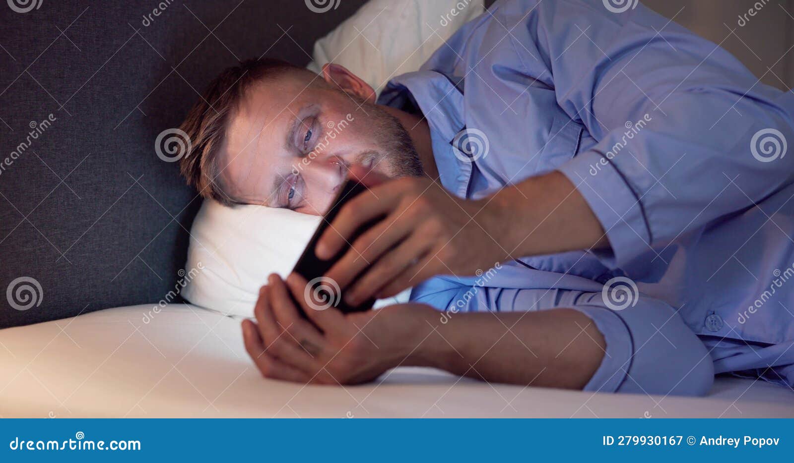 Man Lying on Bed Using Mobile Phone Stock Image - Image of human ...