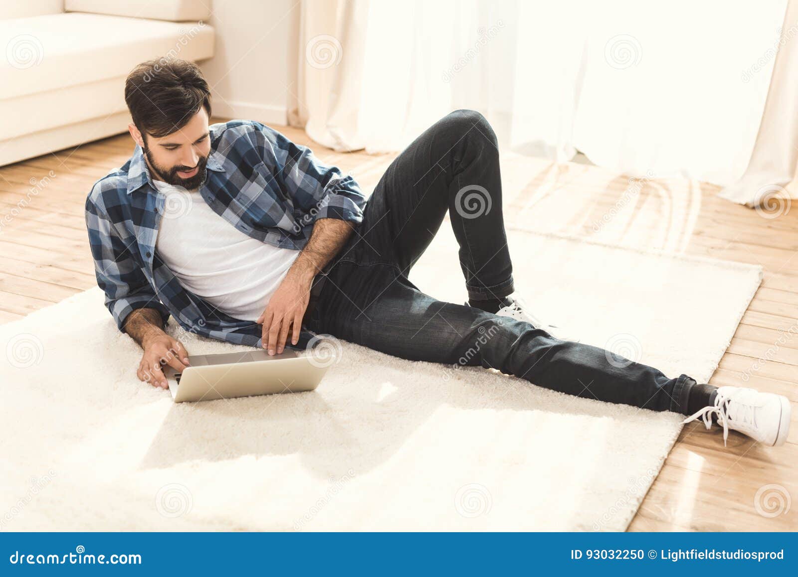 Man Lying on Carpet and Using Laptop Stock Photo - Image of home ...
