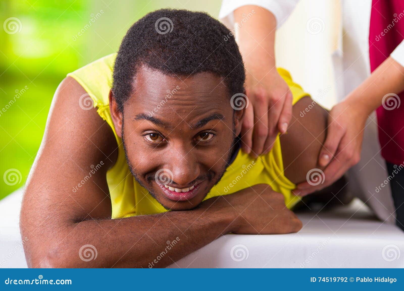 Man Lying Down Getting Physical Shoulder Treatment from Physio ...