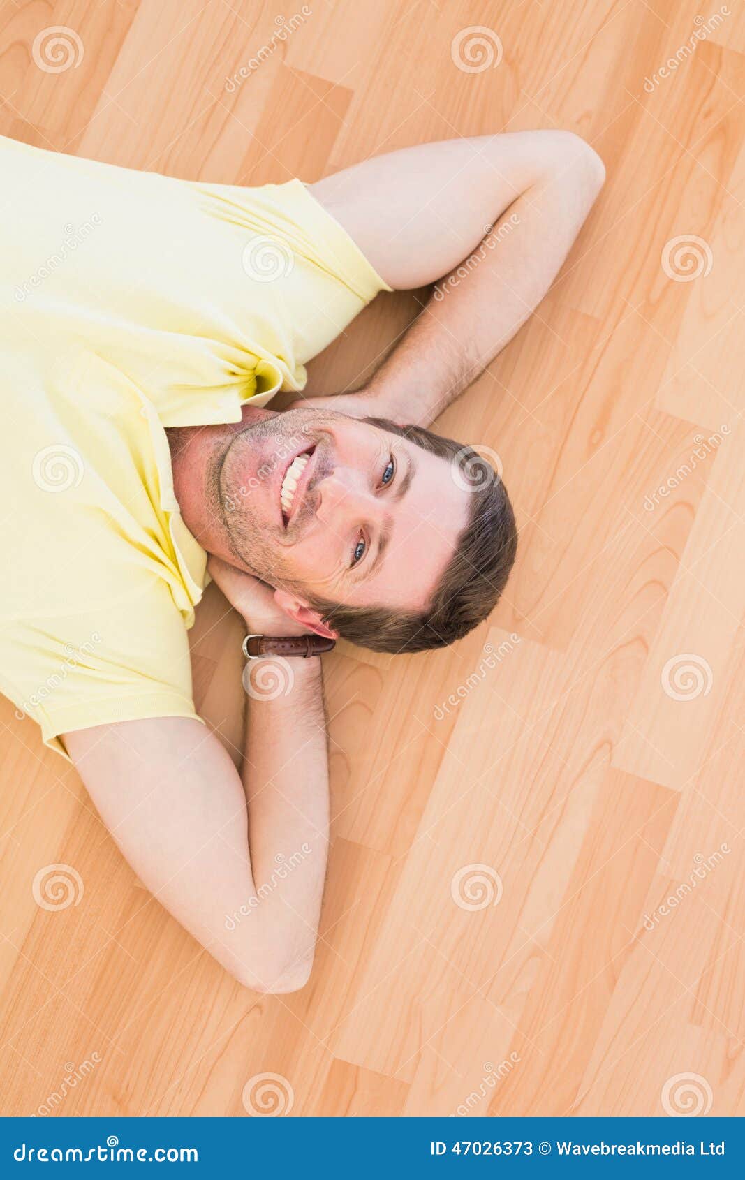 A Man Lying on Floor at Home Stock Image - Image of male, peaceful ...