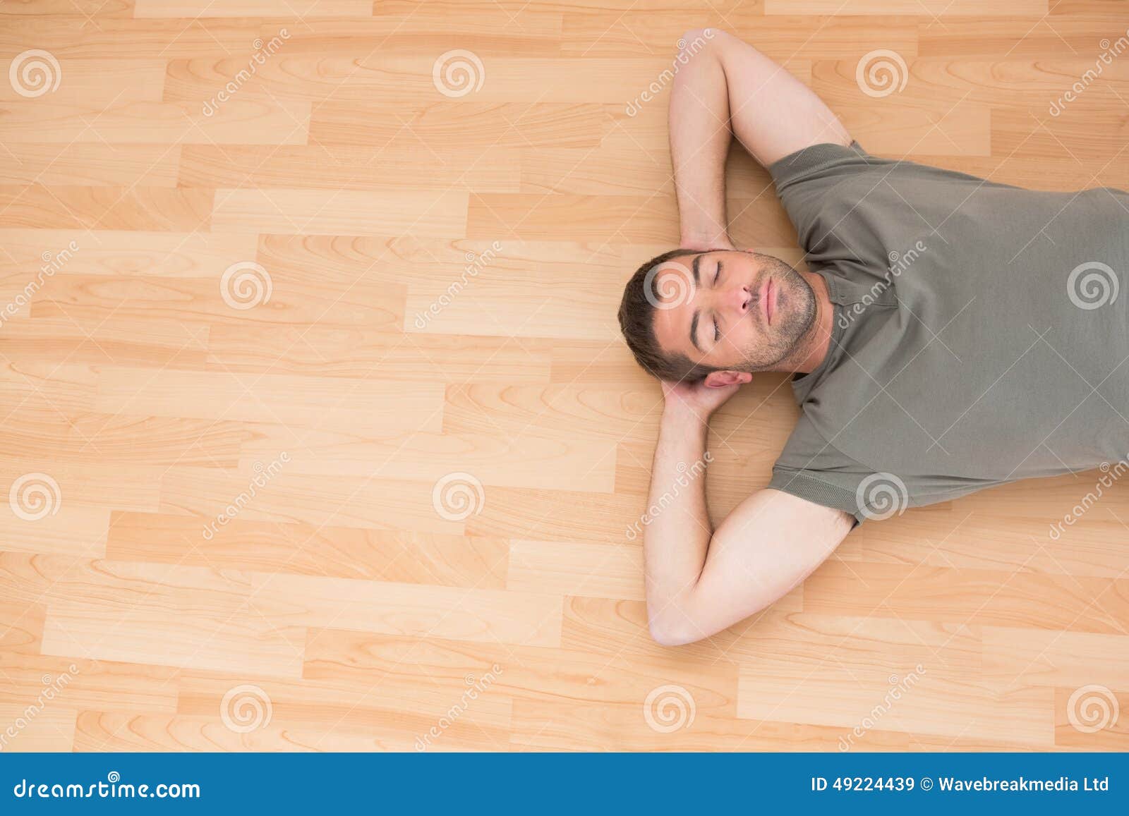 A Man Lying on Floor at Home Stock Image - Image of living, life: 49224439