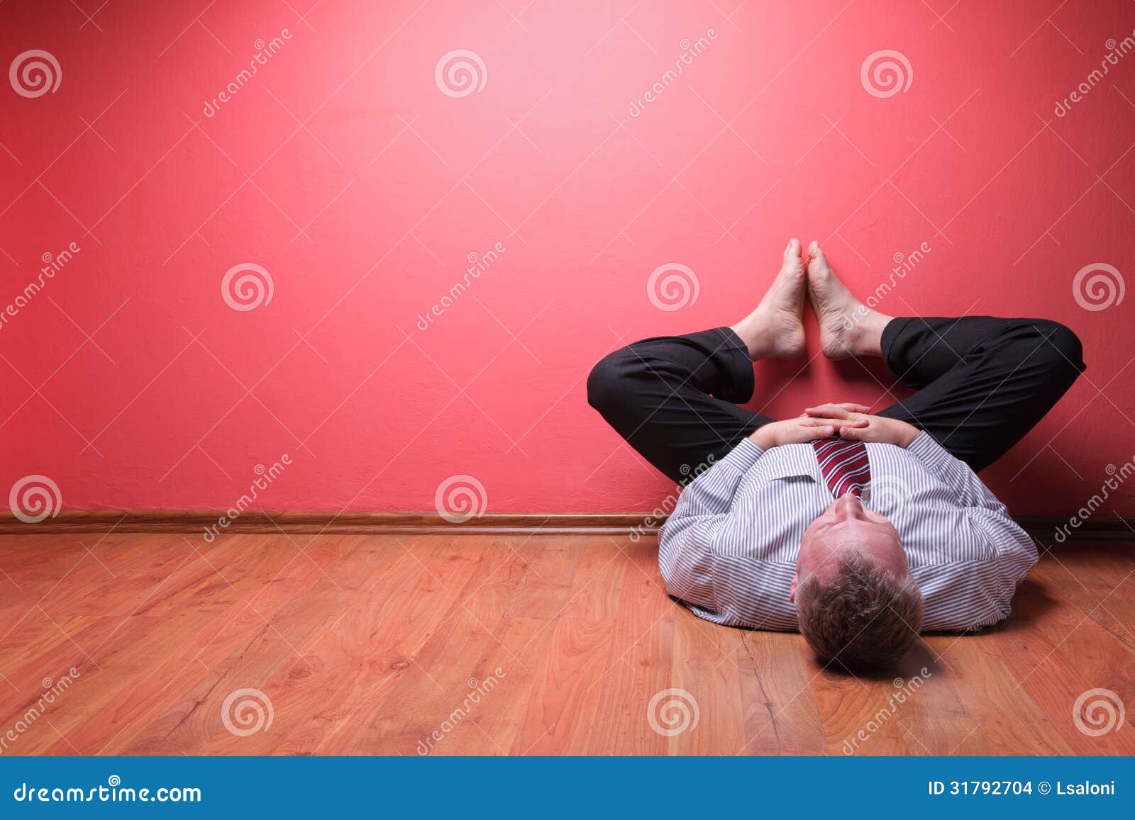 Man lying in the floor stock photo. Image of colorful - 31792704