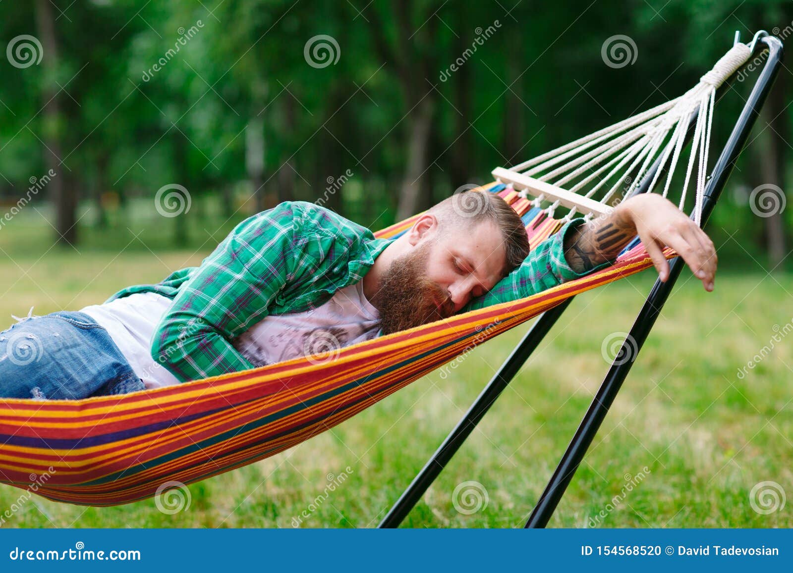 The Man is Lying on a Hammock. Stock Photo - Image of person, holiday ...