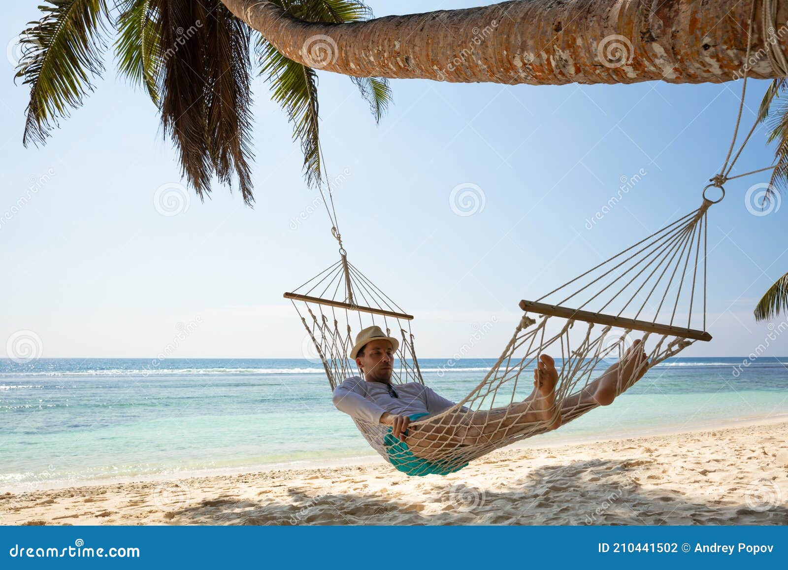 Man Lying on Hammock at Beach Stock Photo - Image of comfortable ...