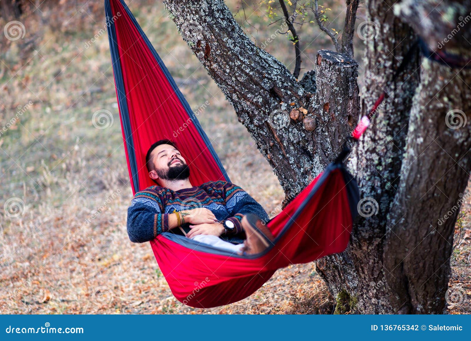 Man Lying in a Hammock and Relaxing Outdoors Stock Photo - Image of ...