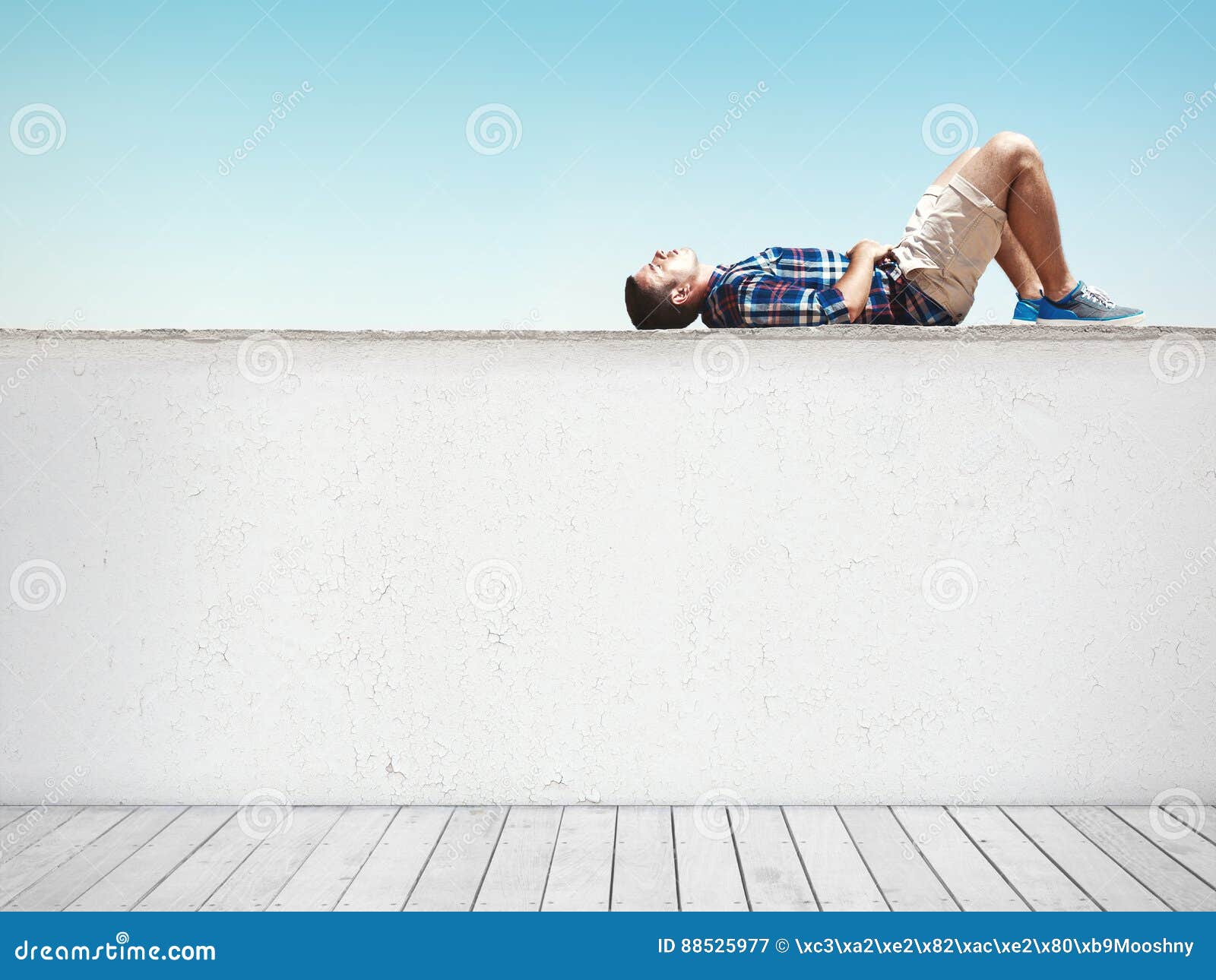 Man Lying Horizontal on the Wall Stock Image - Image of line ...